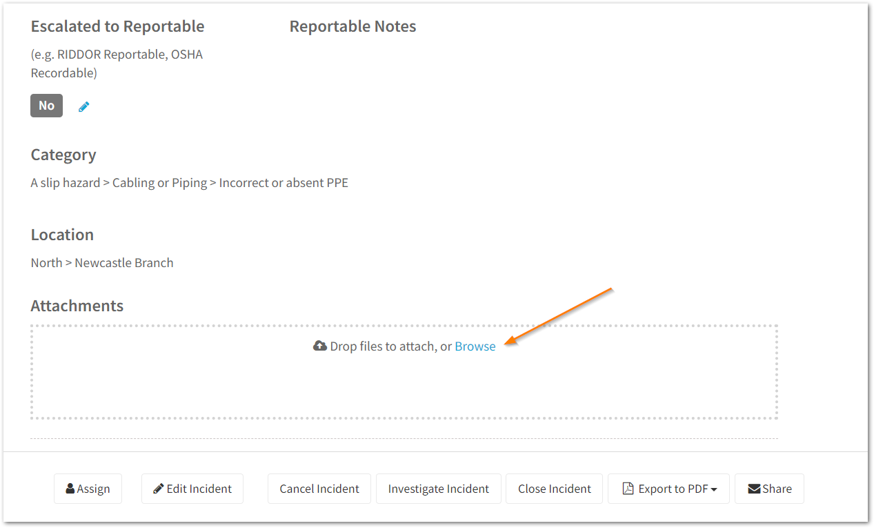 How do I attach a file to an incident report?